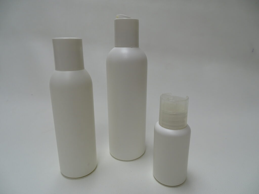 Botella plástico blanca con tapa disc top blanco y natural. - Envases Fuste